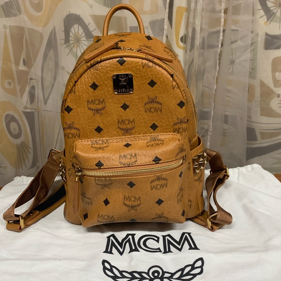 MCM | Bags | Mcm Stark Mini Visetos Side Studded Leather Backpack ...